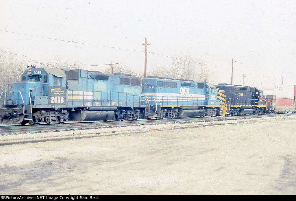 CMNW 2038, GATX 3731, and CMNW 2039